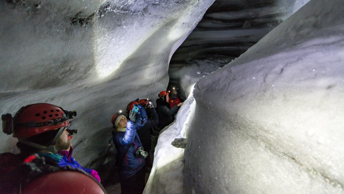 Ice cave: Hike to explore the ice cave - Svalbard Wildlife Expeditions ...