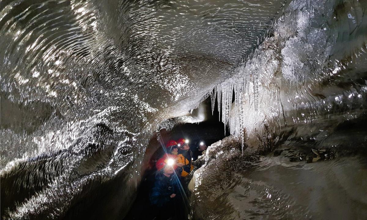 Ice cave: Hike to explore the ice cave - Svalbard Wildlife Expeditions ...