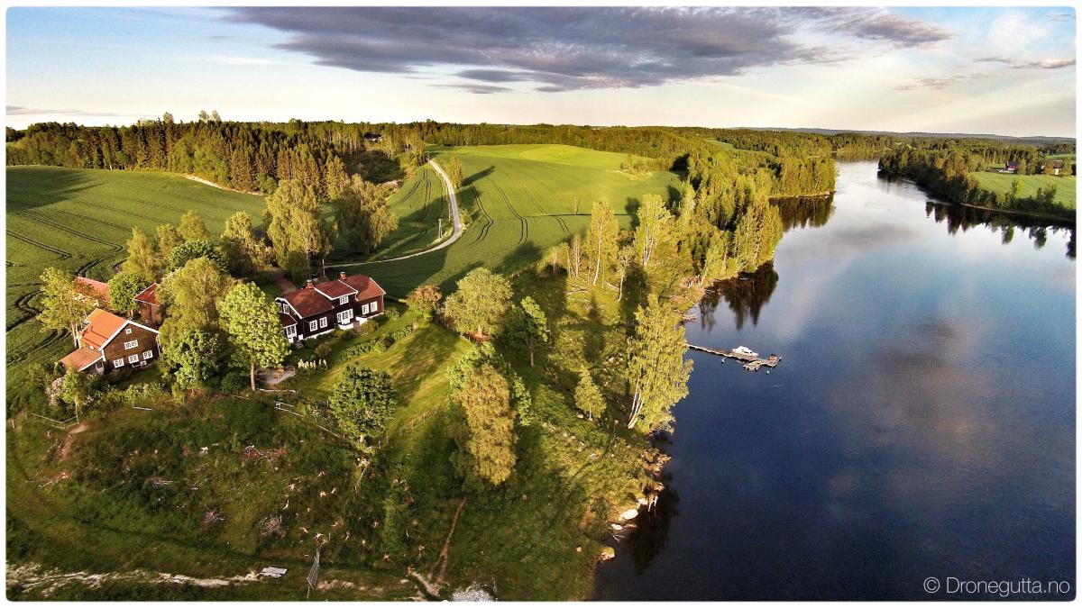 Huser Farm by the river Vorma | Buildings & Monuments | Fenstad | Norway